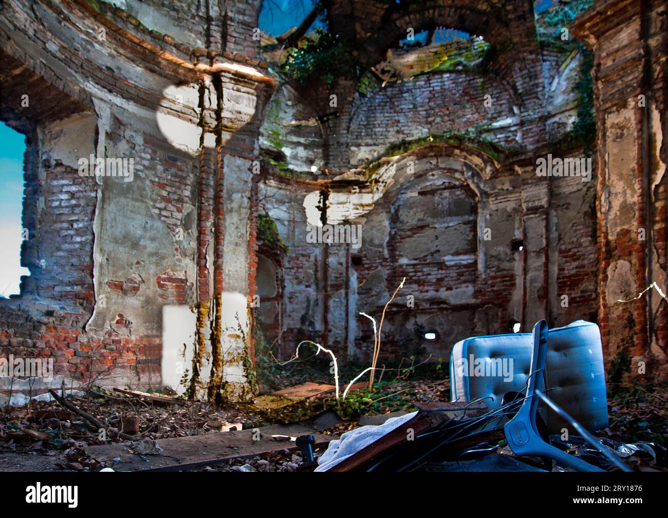 Abandoned and dilapidated church where rubbish and dirt have been ...