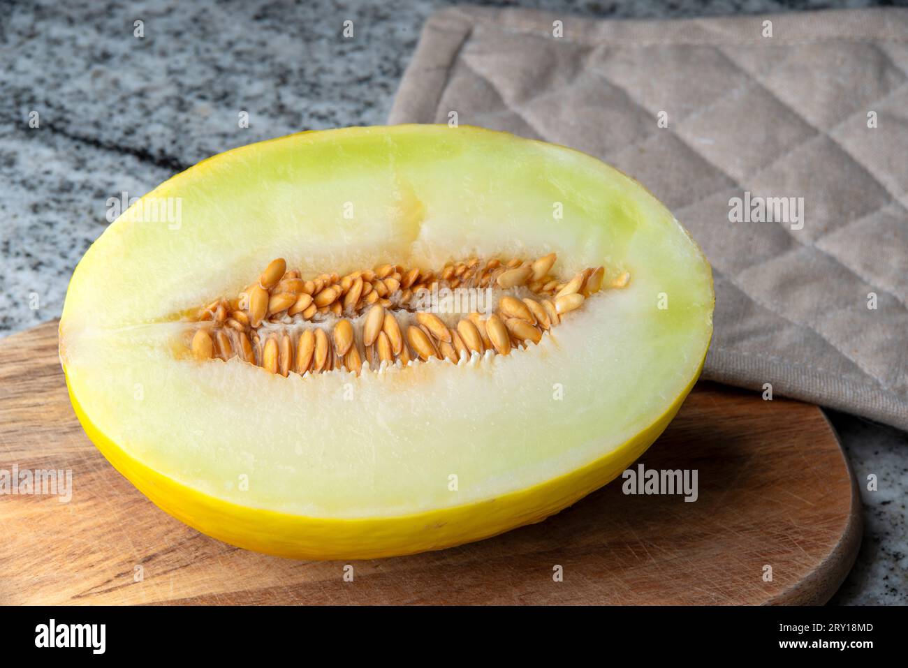 melon cut in half Stock Photo - Alamy