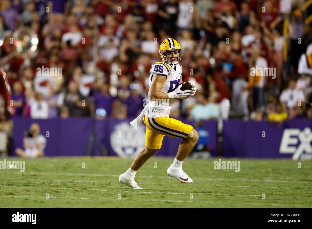 LSU tight end Mason Taylor (86) carries the ball after a reception ...