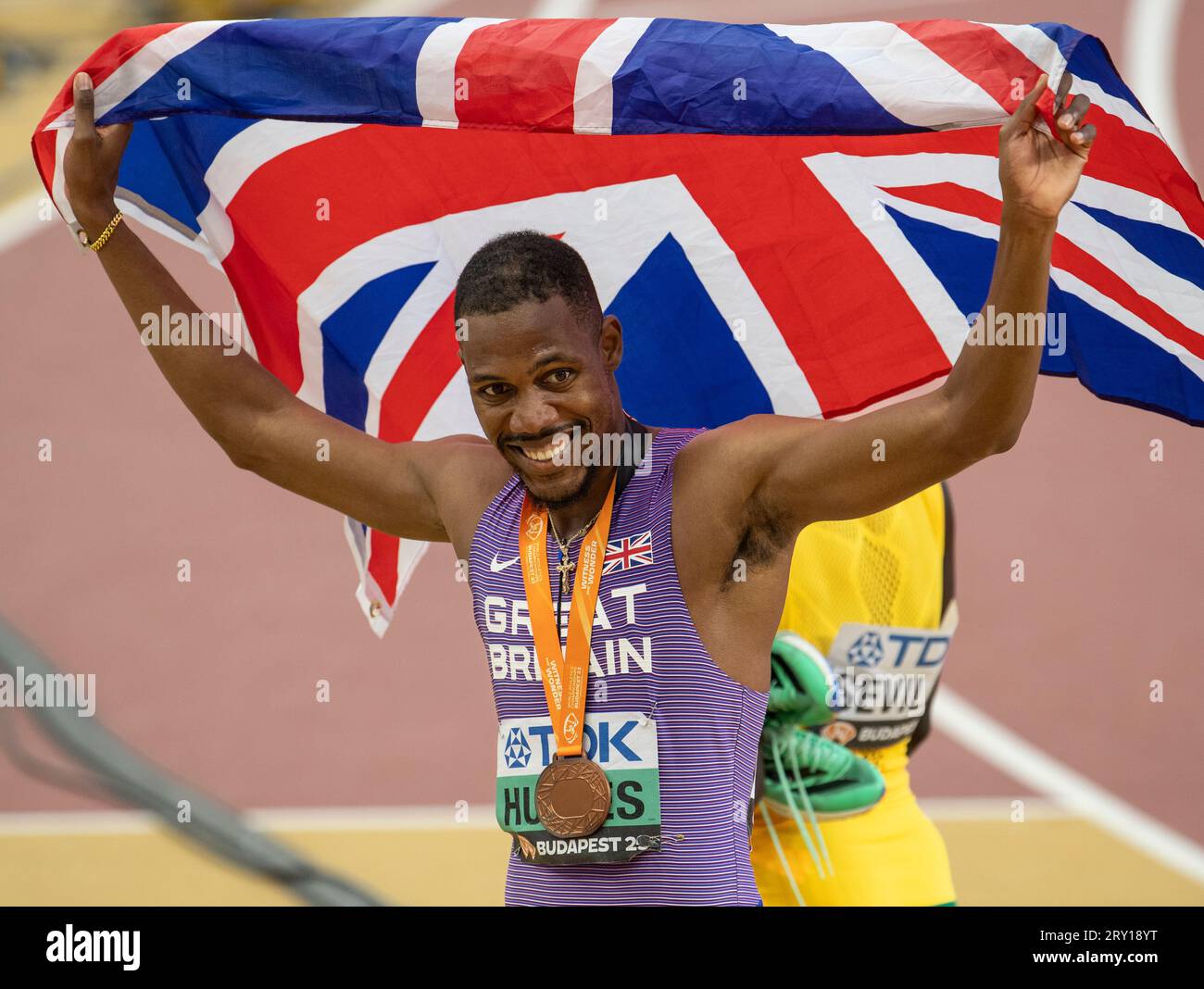Zharnel Hughes of GB & NI celebrating with his bronze medal after competing in the 100m final at ...