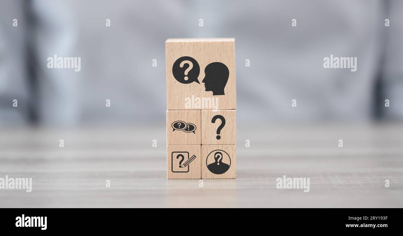 Wooden blocks with symbol of question concept Stock Photo - Alamy