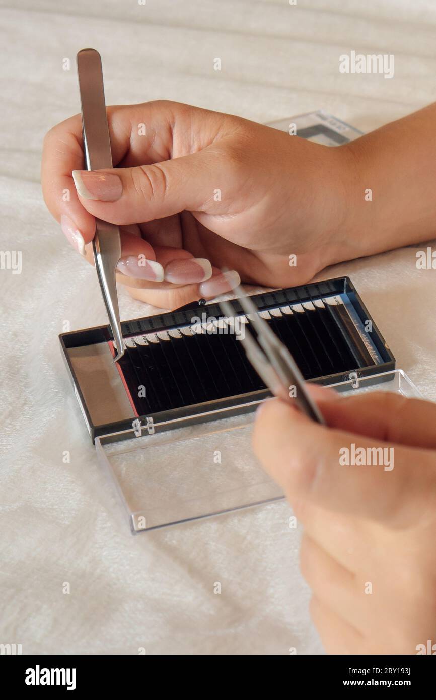 Close up young lashmaker hi-res stock photography and images - Alamy