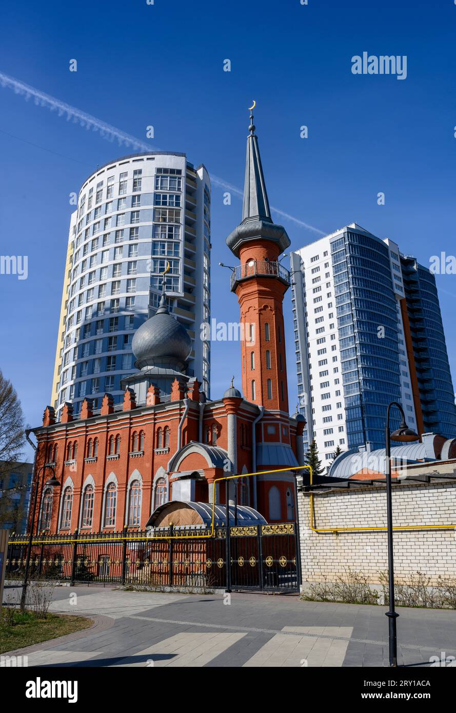 Muslim Mosque on the background of multi-storey modern houses in Nizhny ...