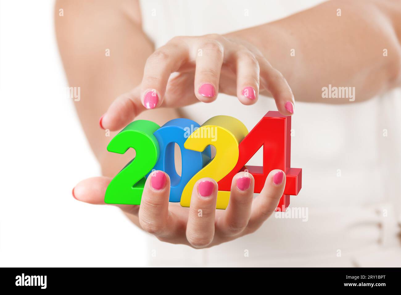 Two Woman Hands Protecting 2024 New Year Sign on a white background ...
