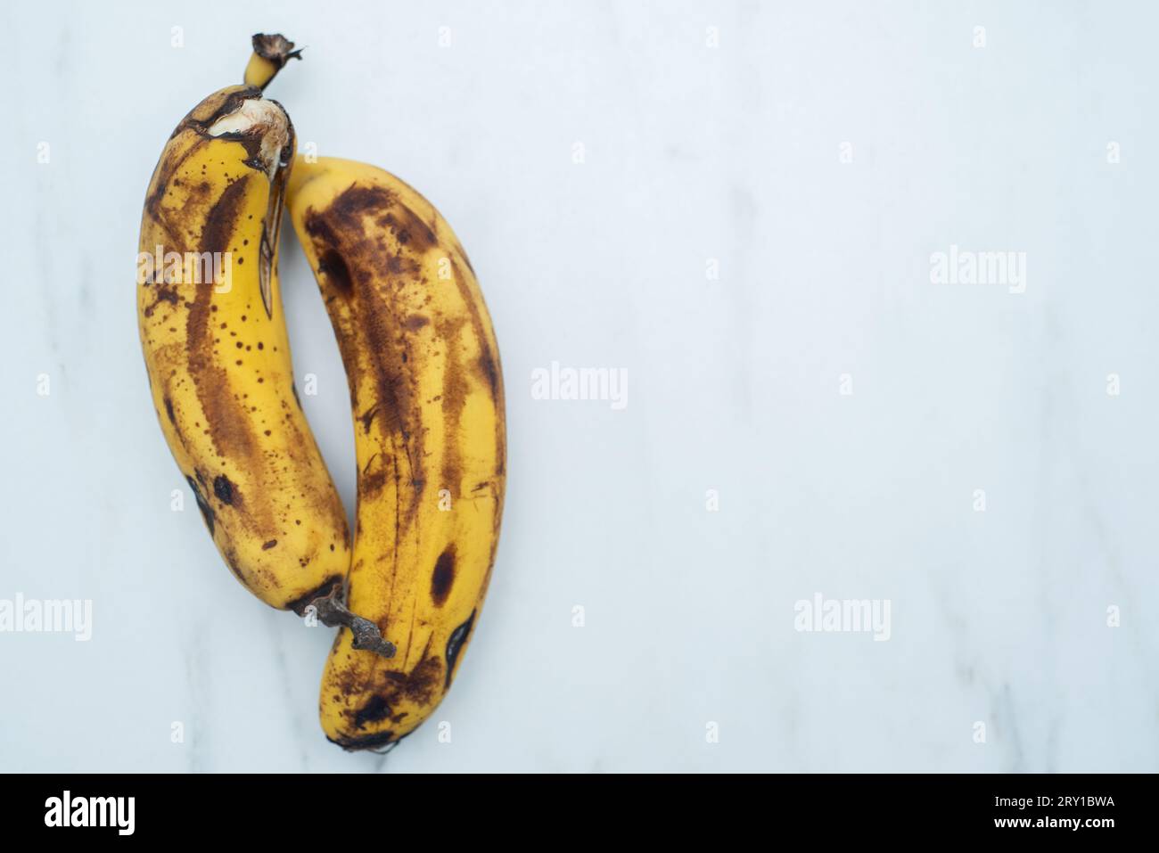 black rotten bananas, rotten bananas on a white background. unhealthy ...