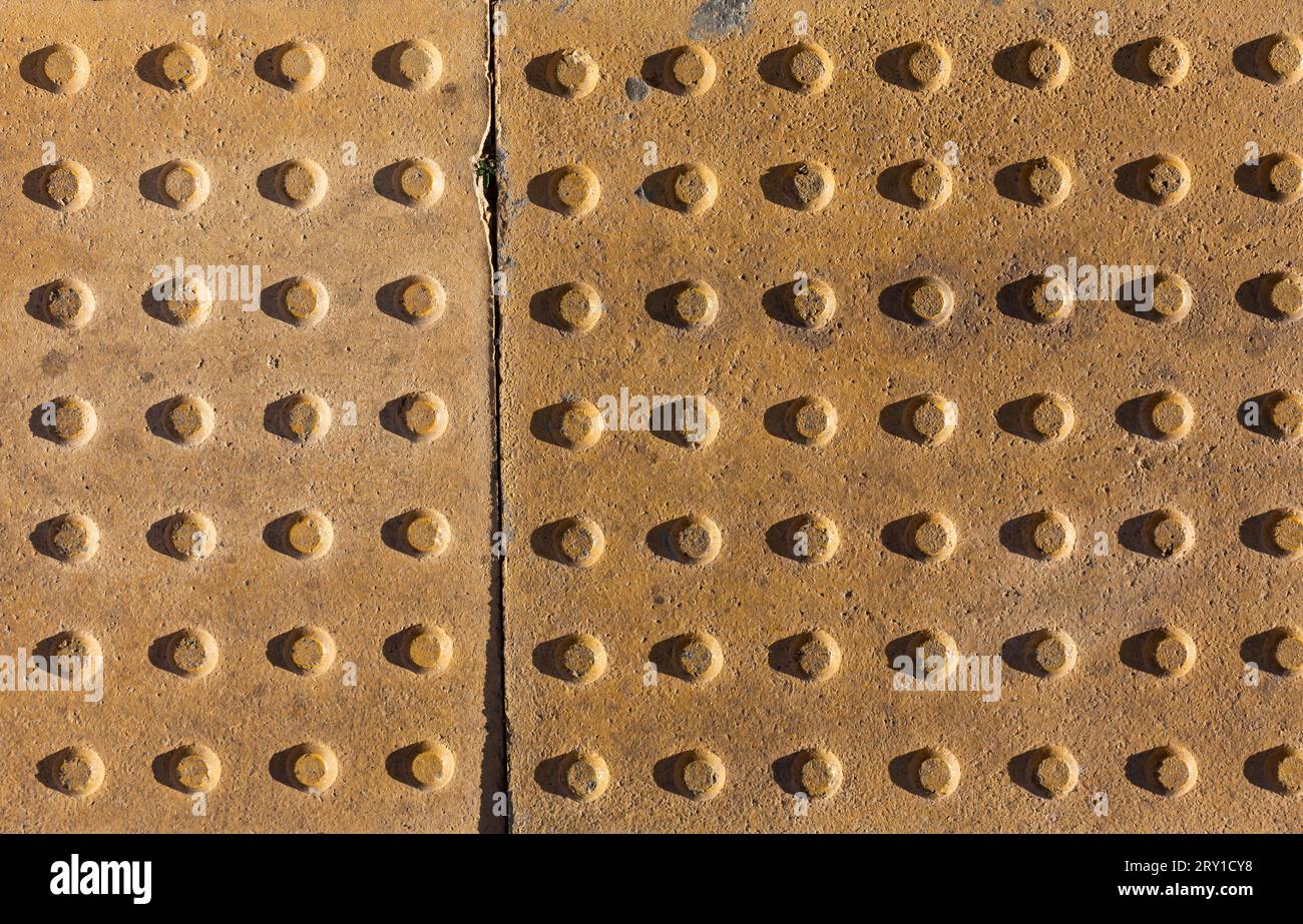 Close-up of manhole cover of steel with rust as background. High ...