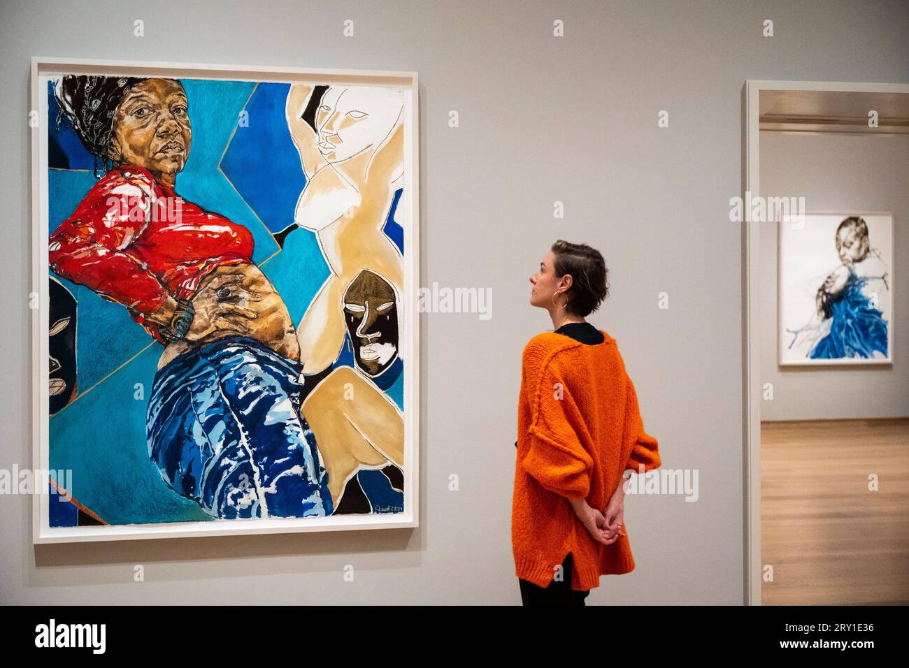 Standing figure with african masks hi-res stock photography and images ...