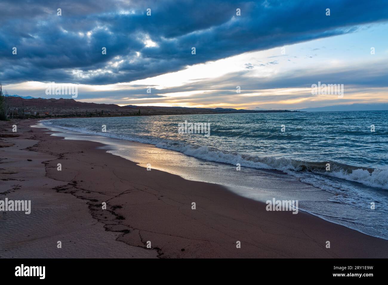 Sunset in issyk kul lake kyrgyzstan Stock Photo - Alamy