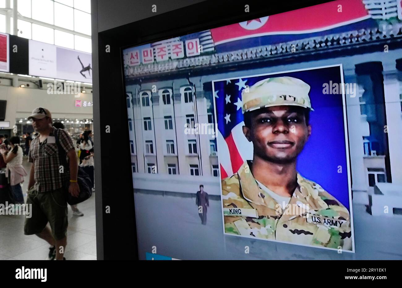 FILE - A TV screen shows a file image of American soldier Travis King ...