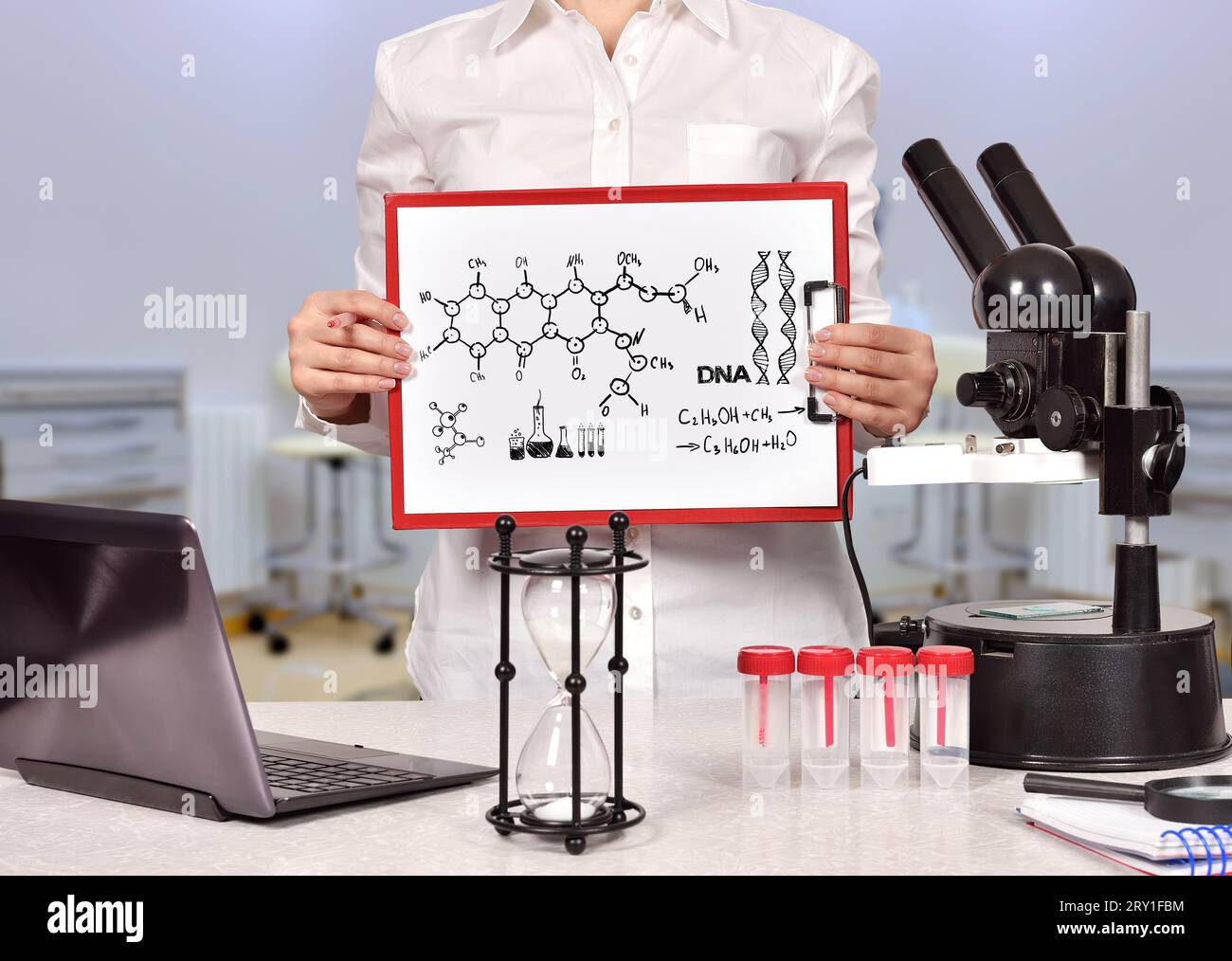Medical researcher woman holding clipboard with drawing chemical scheme ...
