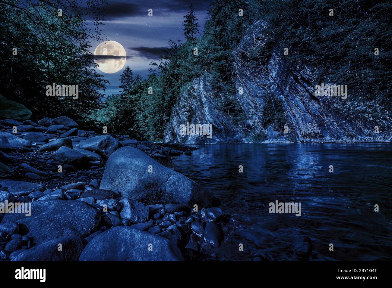summer landscape at night. shore of mountain river with stones and a ...