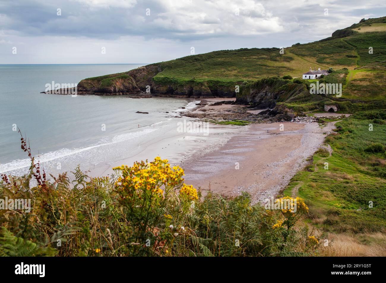 Green hillside meets turquoise hi-res stock photography and images - Alamy