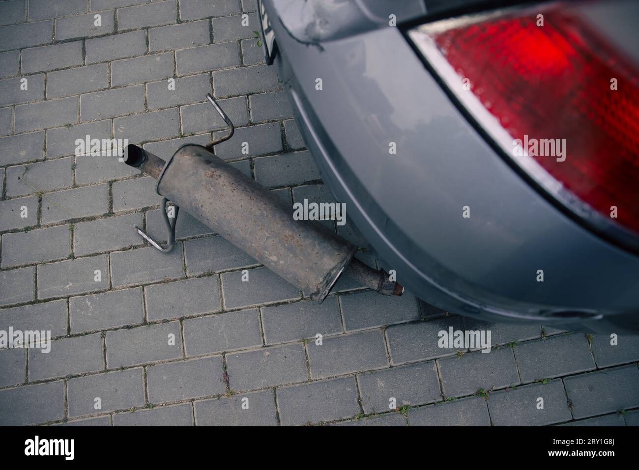 Car muffler fallen off hi-res stock photography and images - Alamy