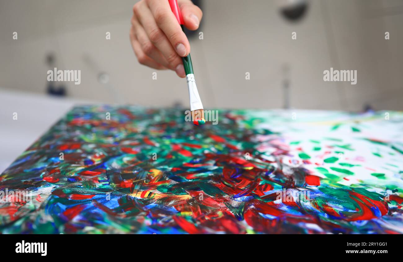 Mixed colours on palette Stock Photo - Alamy