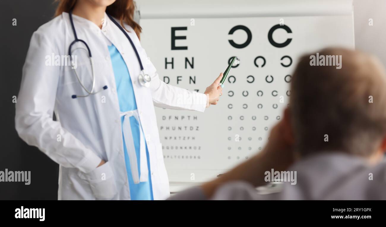 Doctor on examination of man Stock Photo - Alamy