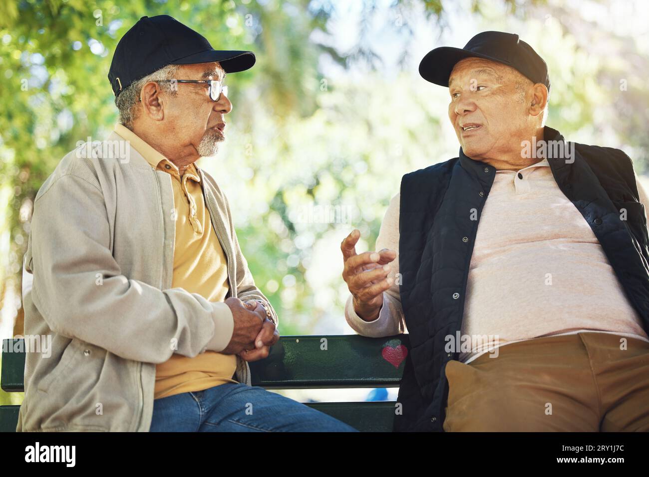 Elderly men, park and communication with friendship, nature and ...