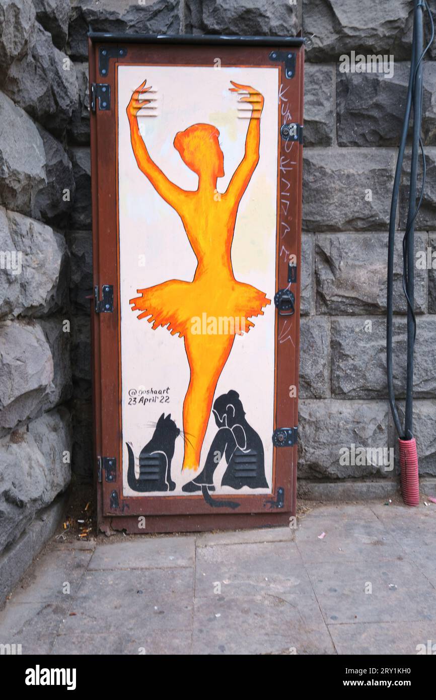 An electrical utility box with a painting of a ballet dancer, done in ...