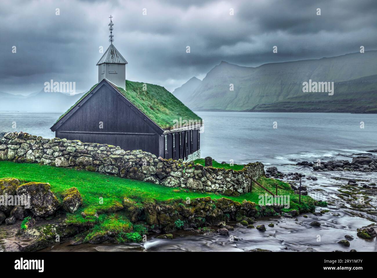 The picturesque village of Funningur in the Faroe Islands Stock Photo ...