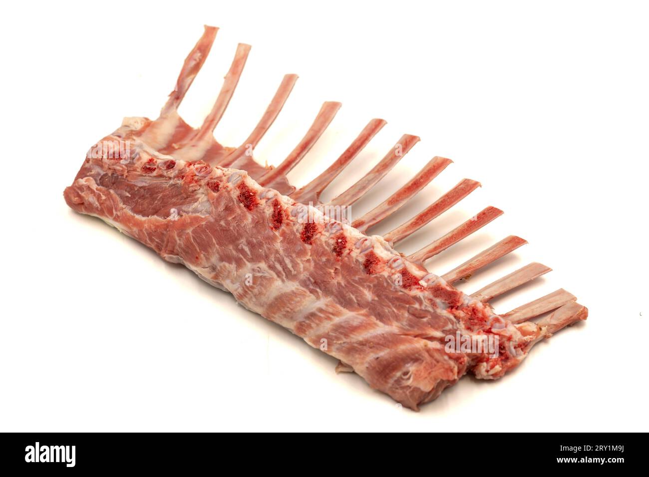Lamb rack cutlet isolated on white background. Raw lamb chops with ...