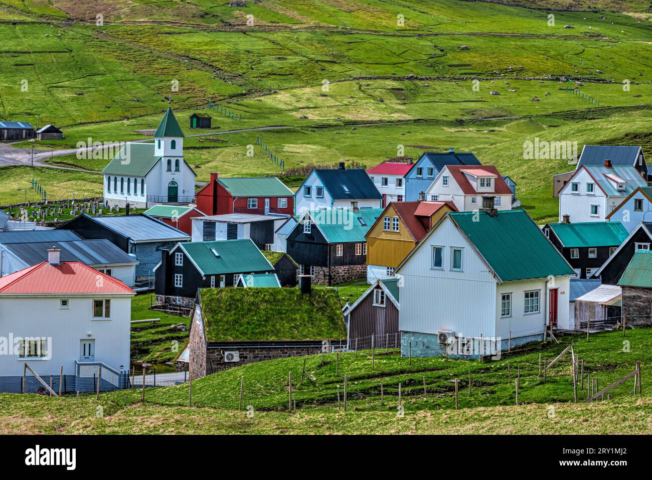 The village of Gjogv and its natural harbour in the Faroe Islands Stock ...