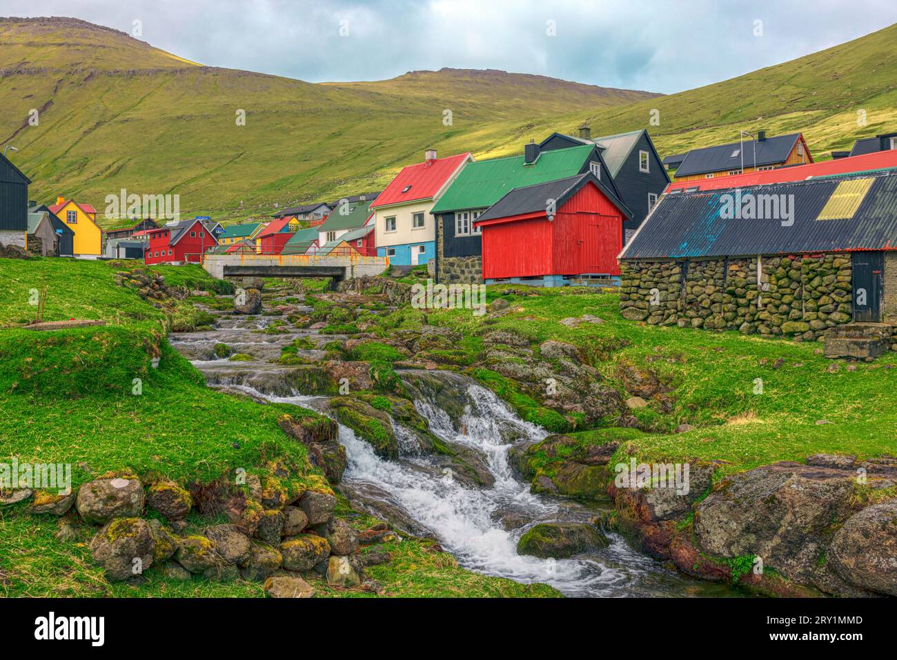The village of Gjogv and its natural harbour in the Faroe Islands Stock ...