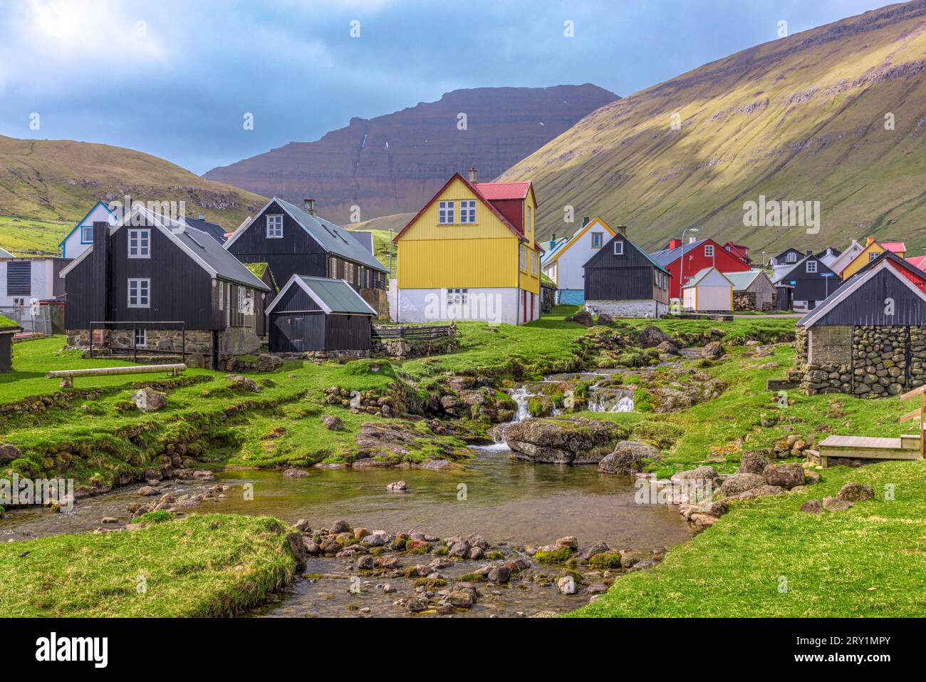 The village of Gjogv and its natural harbour in the Faroe Islands Stock ...
