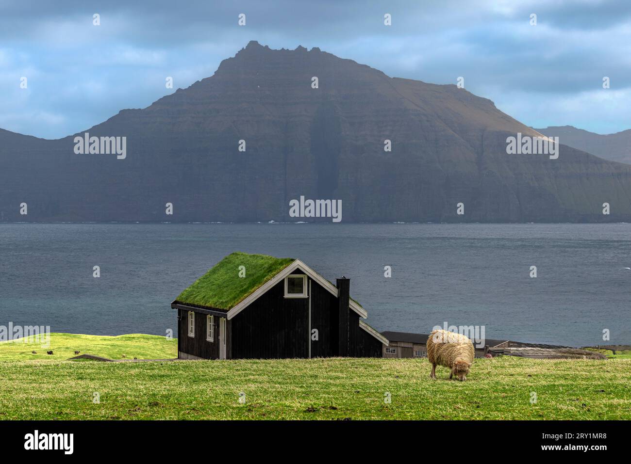 The village of Gjogv and its natural harbour in the Faroe Islands Stock ...