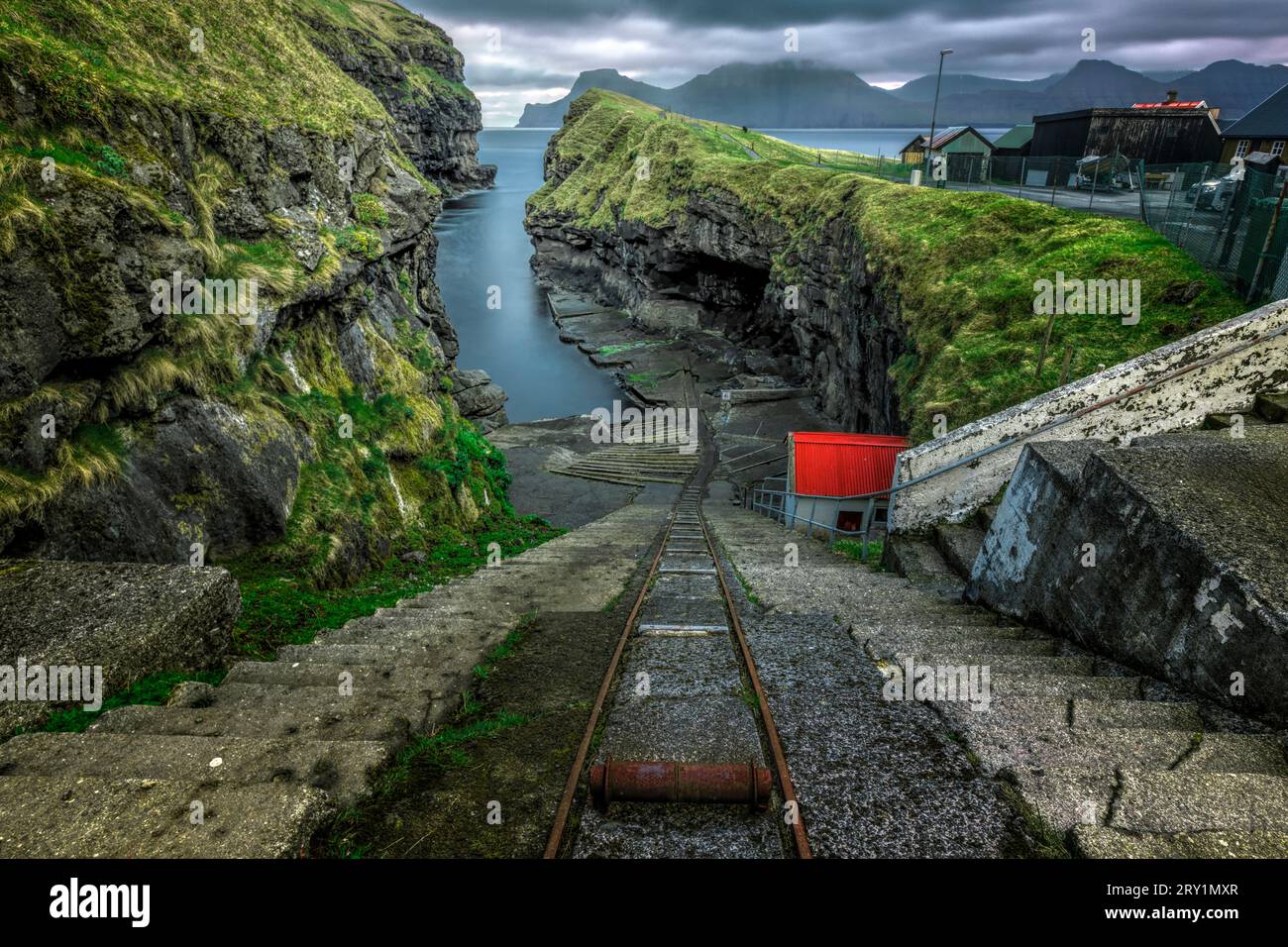 The village of Gjogv and its natural harbour in the Faroe Islands Stock ...