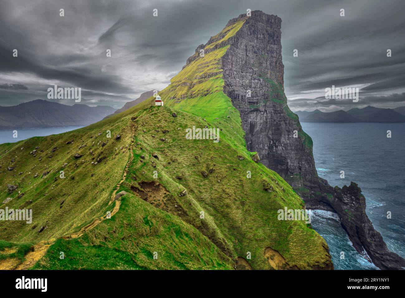 Kallur Lighthouse and James Bond memorial stone on Kalsoy, Faroe ...