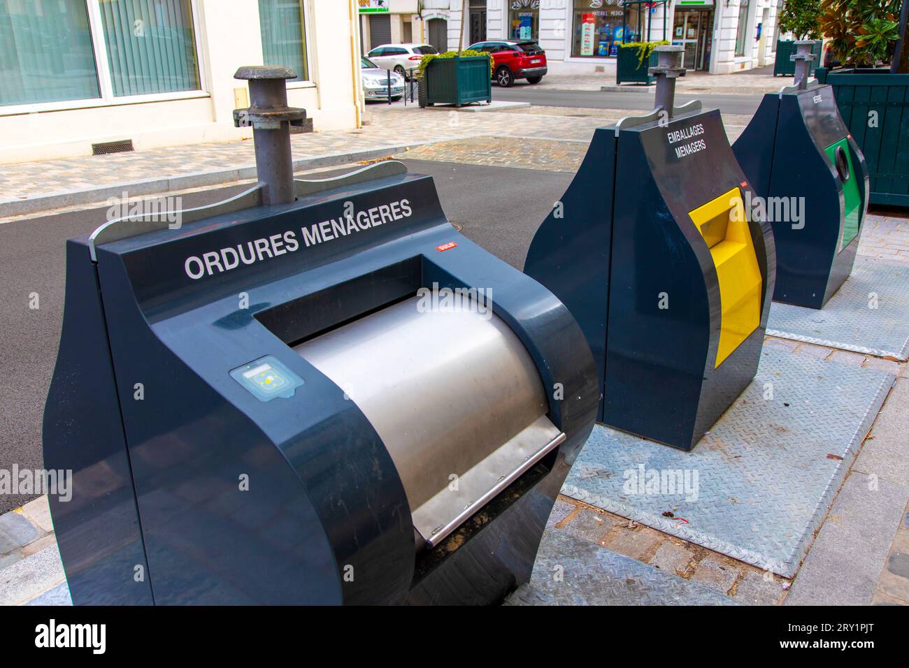 Underground container trash cans Stock Photo - Alamy