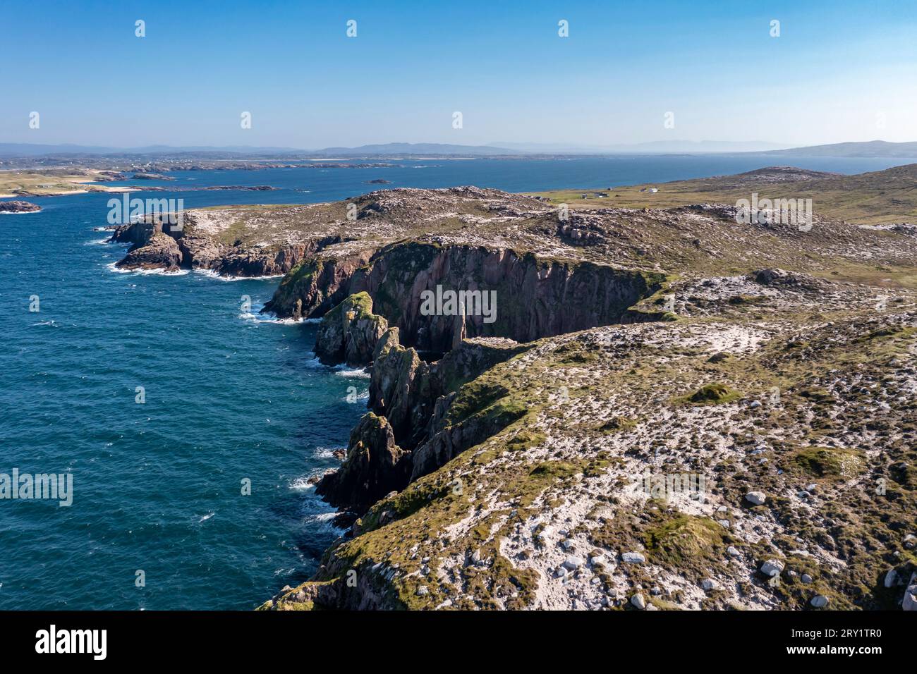 Aerial view of cliffs and sea stacks on Owey Island, County Donegal ...
