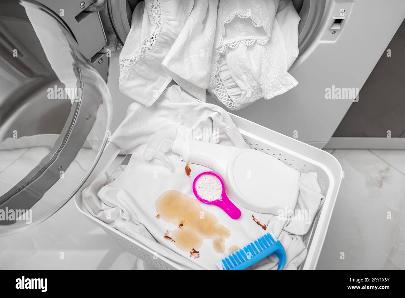 Removing stains from white clothes Stock Photo - Alamy