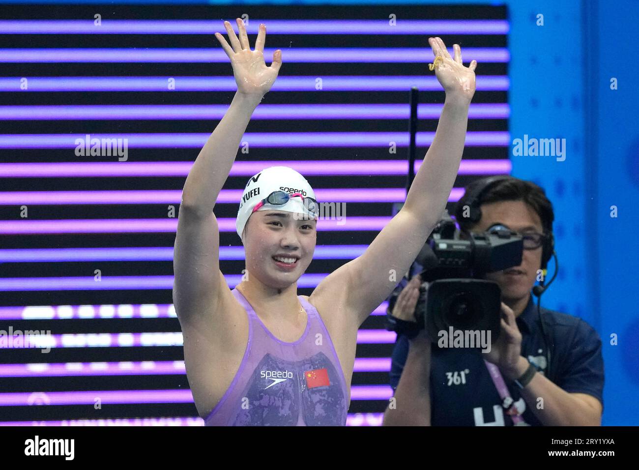China's Zhang Yufei celebrates after winning the women's 50m freestyle ...
