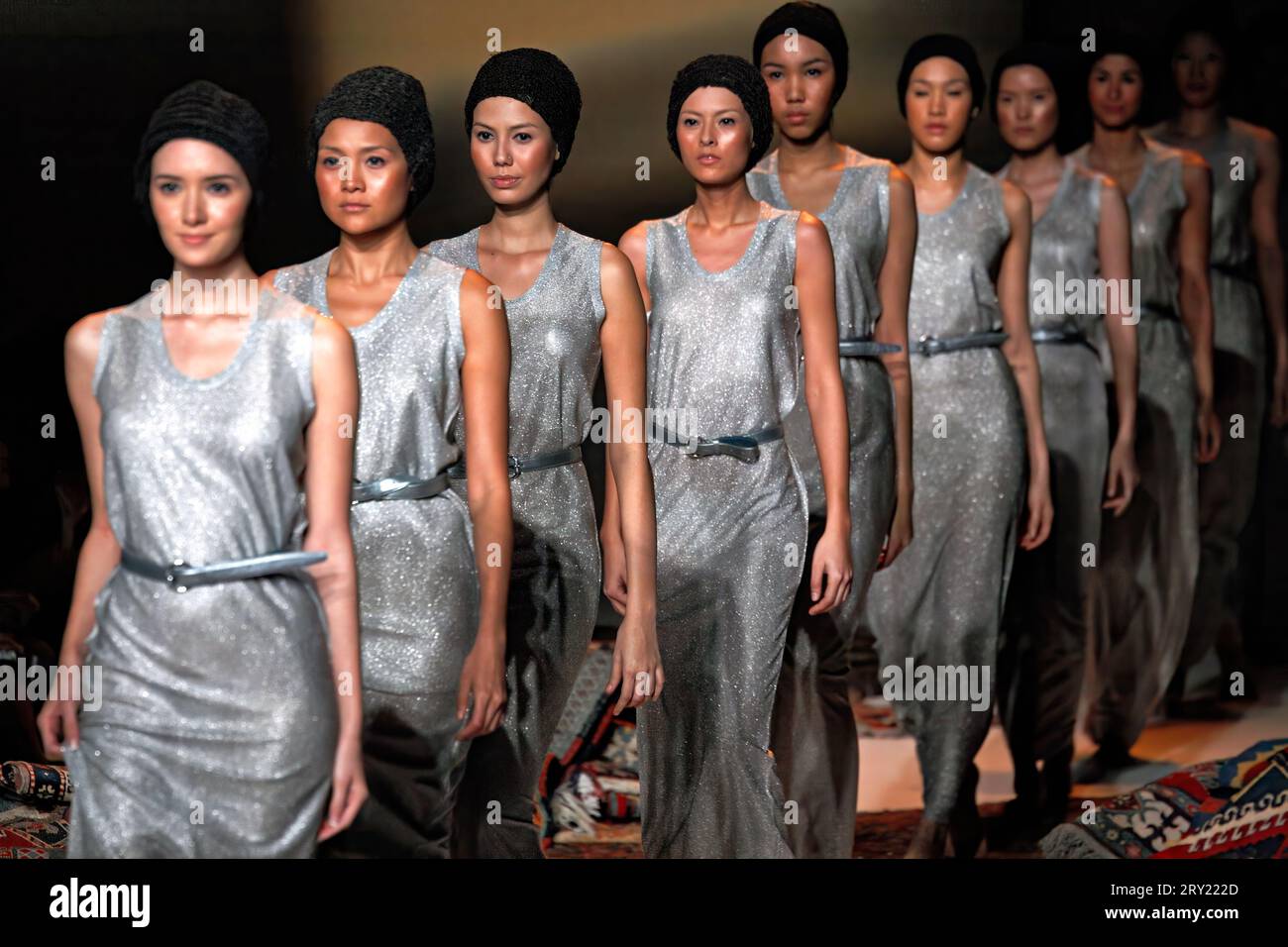 Attractive asian models showing collection on catwalk at Elle Fashion ...