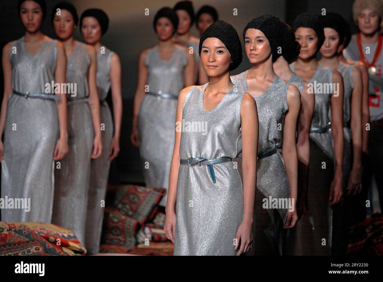 Attractive asian models showing collection on catwalk at Elle Fashion ...