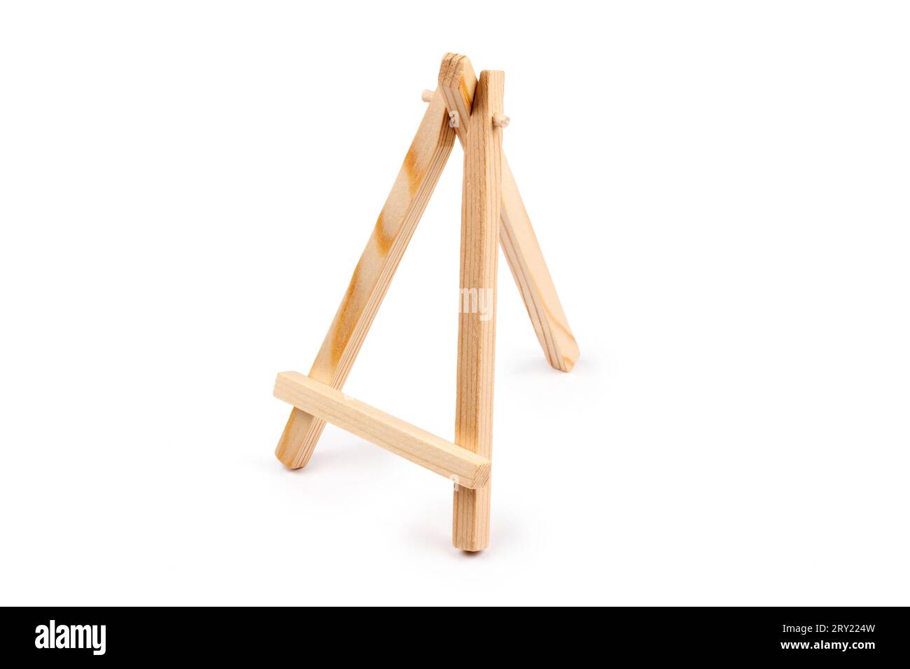 Mini wooden easel on white background Stock Photo - Alamy