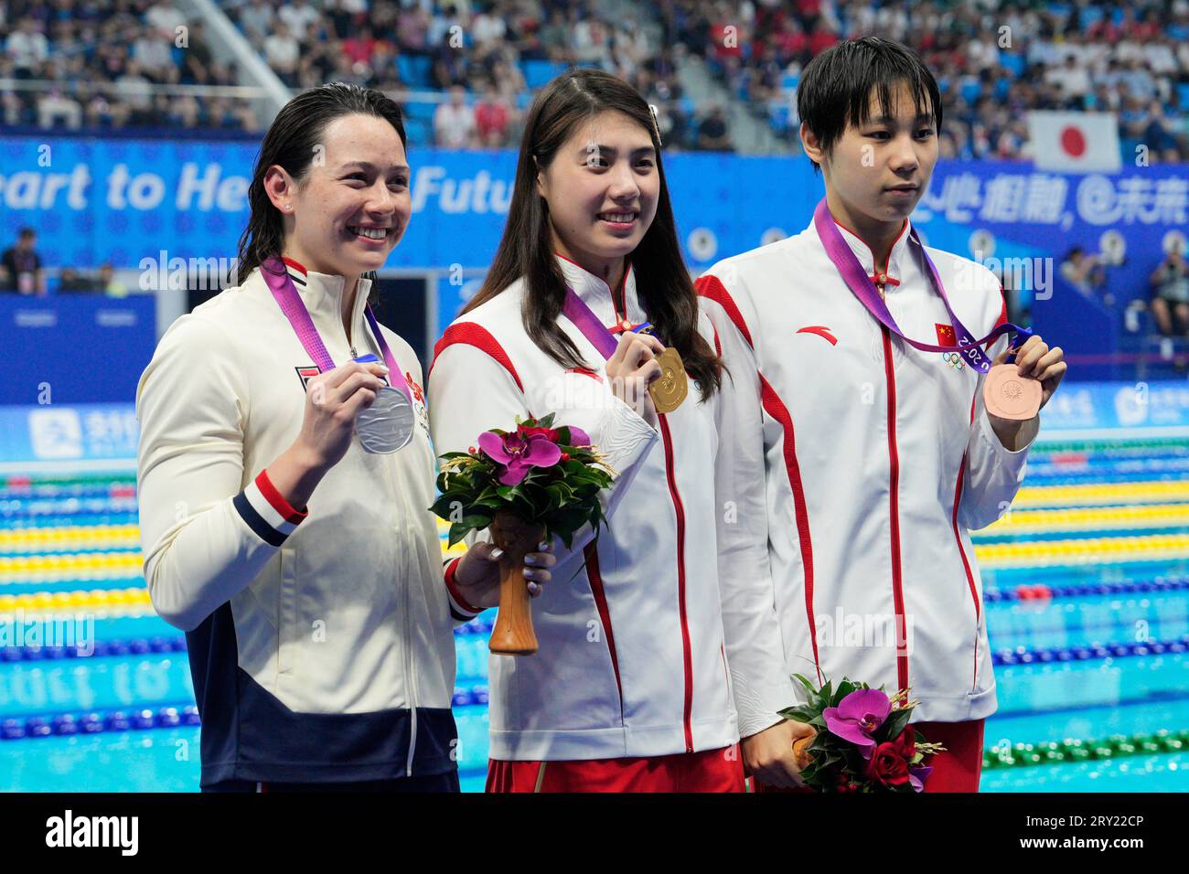 Medalists, from left to right, Hong Kong's Siobhan Bernadette Haughey, silver, China's Zhang ...