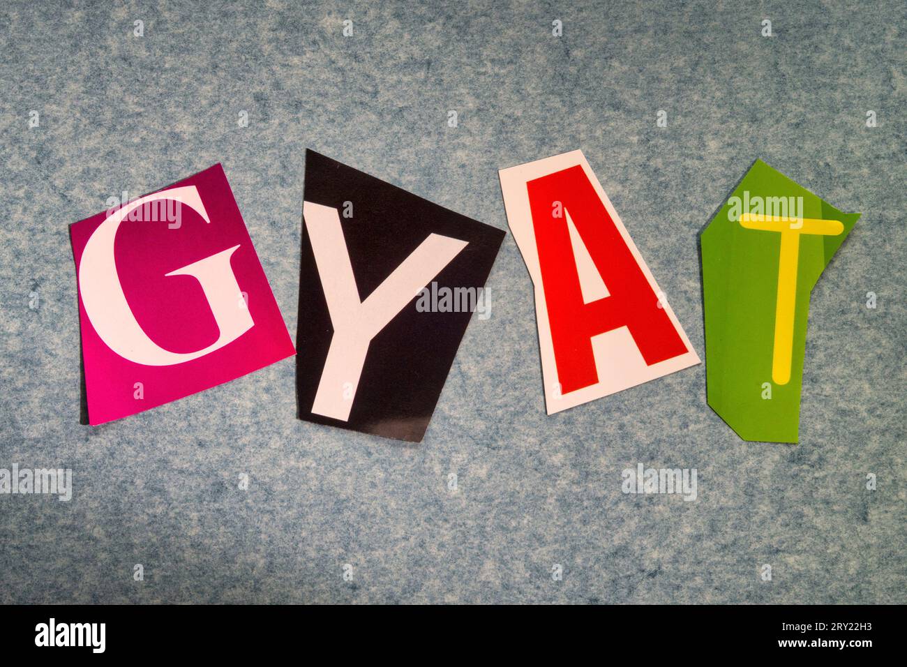 The acronym "GYAT" slang using cut-out paper letters in the ransom note ...