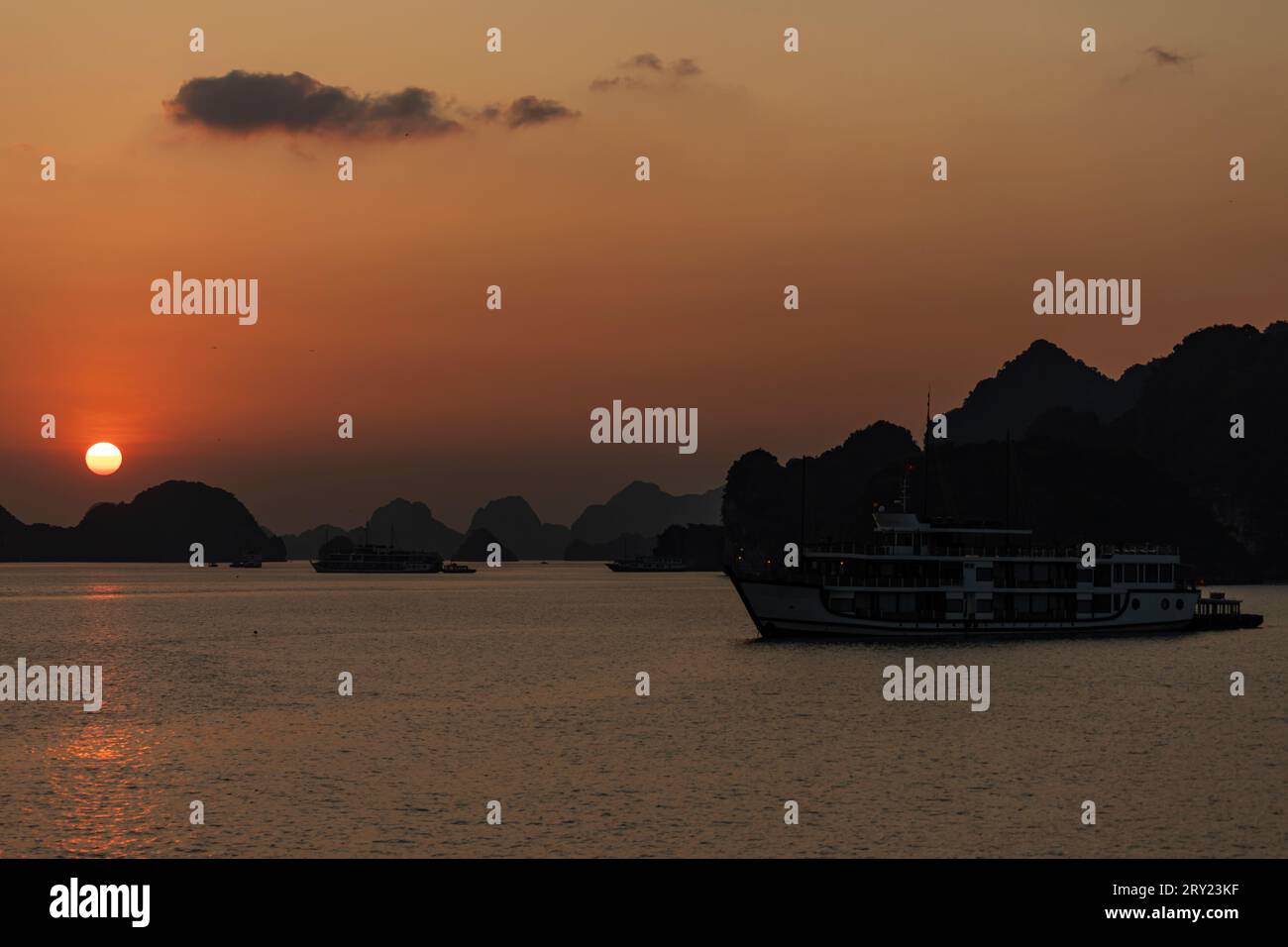Sunset in the Ha Long Bay of Vietnam Stock Photo - Alamy