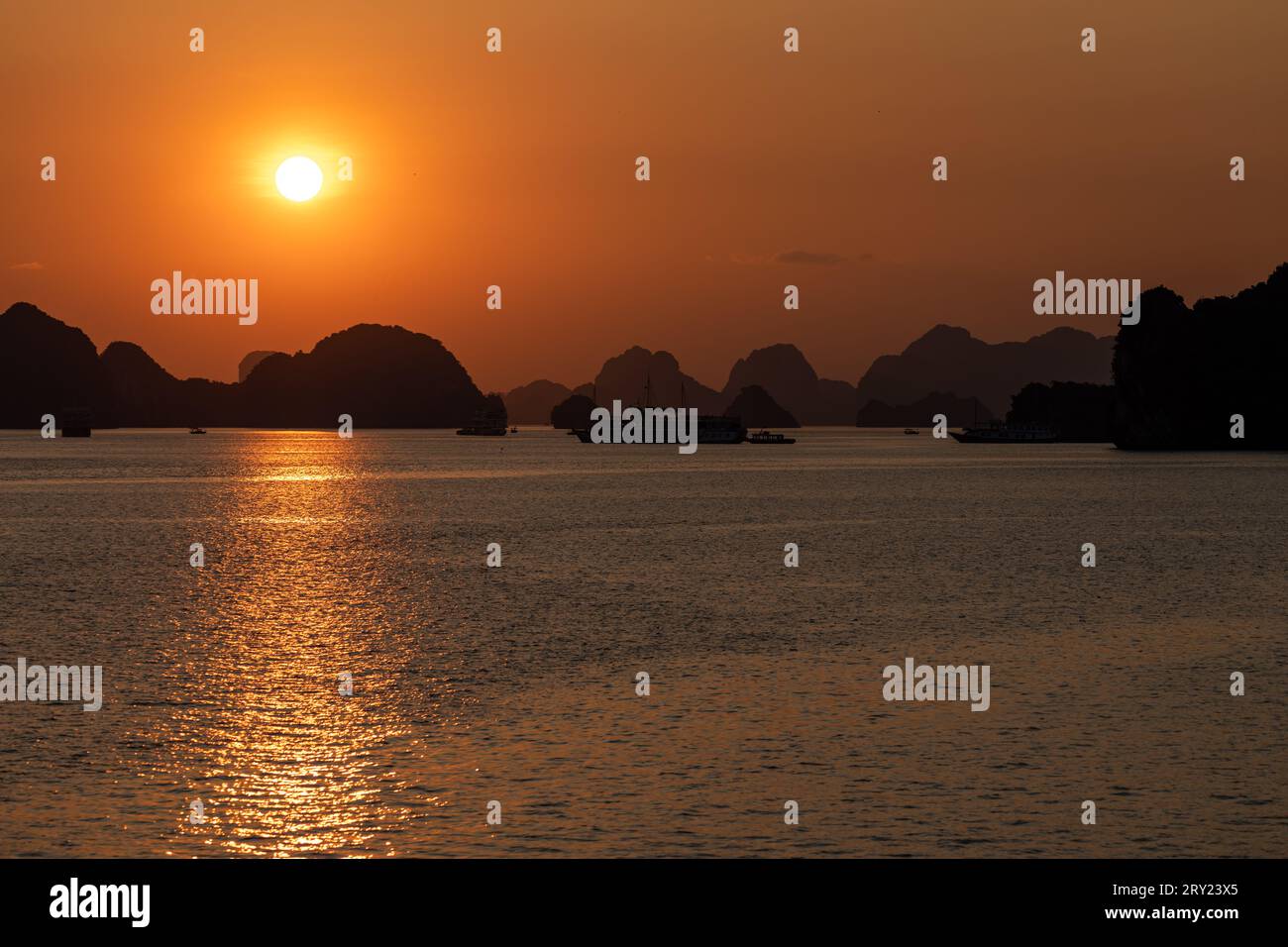 Sunset in the Ha Long Bay of Vietnam Stock Photo - Alamy