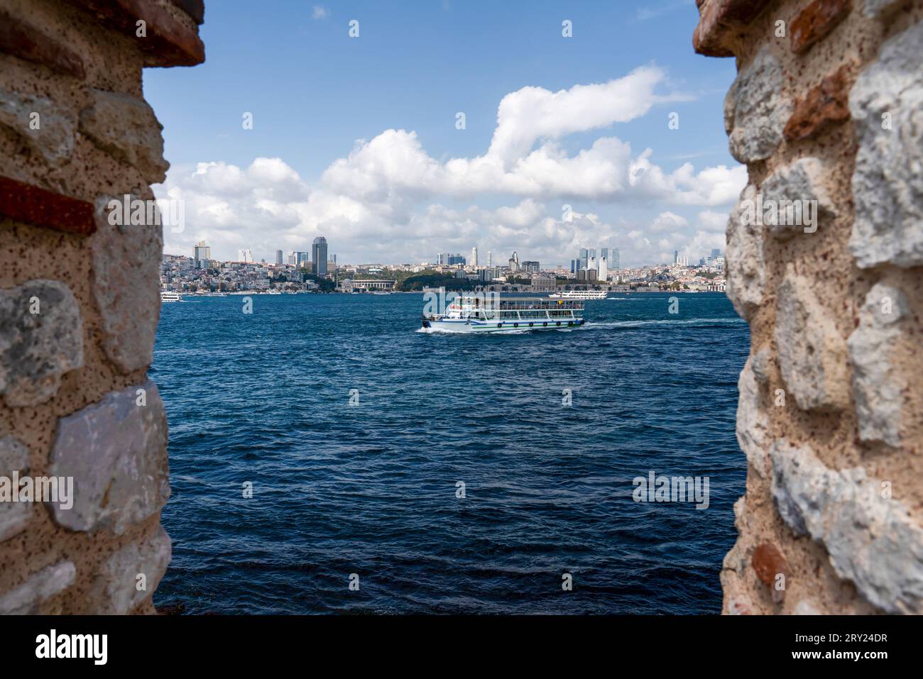 Stone walls of the Maiden's Tower and a panoramic view of the Bosphorus ...