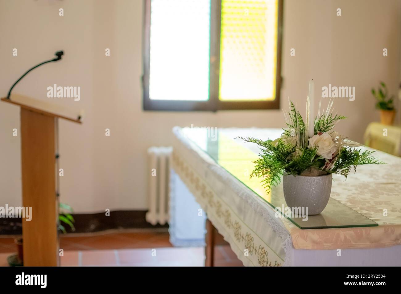Altar of church with lectern and microphone for priest speeches with ...