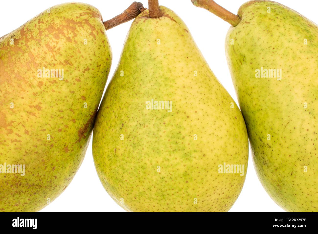 Three ripe green pears, macro, isolated on white background Stock Photo ...