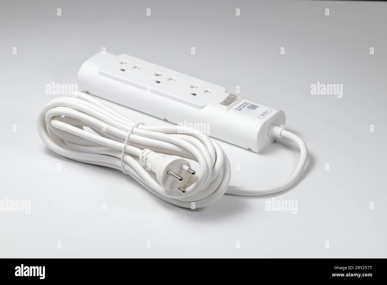 Closeup of electrical power strip or extension block on white ...