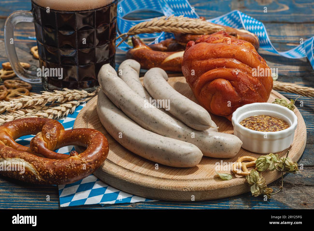 Traditional Oktoberfest set. Pretzels, beer, weisswurst and eisbein ...