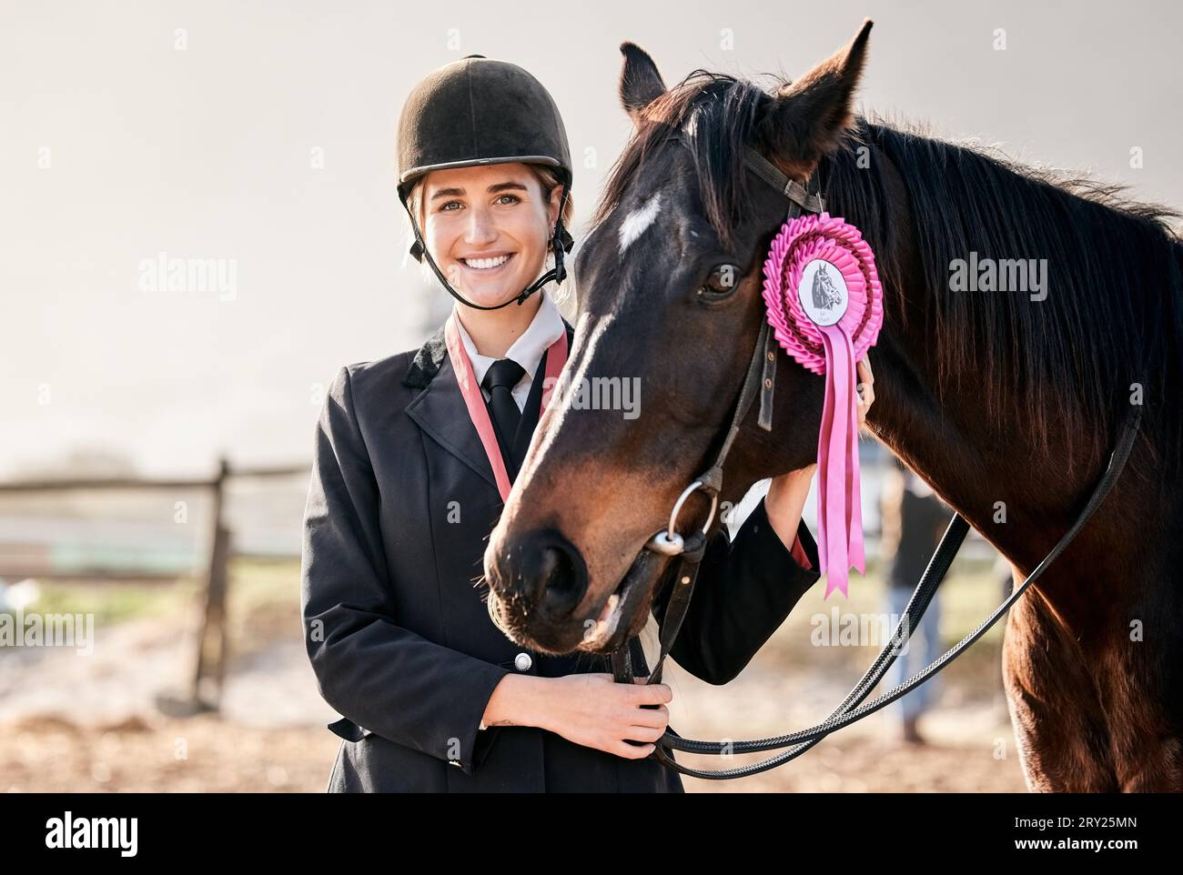 Portrait, equestrian and a woman winner with an animal on a ranch for ...