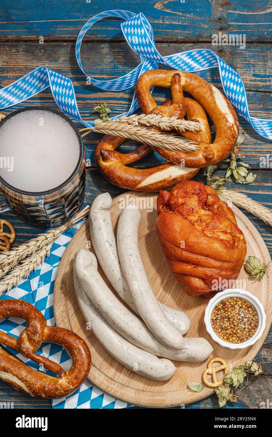 Traditional Oktoberfest set. Pretzels, beer, weisswurst and eisbein ...