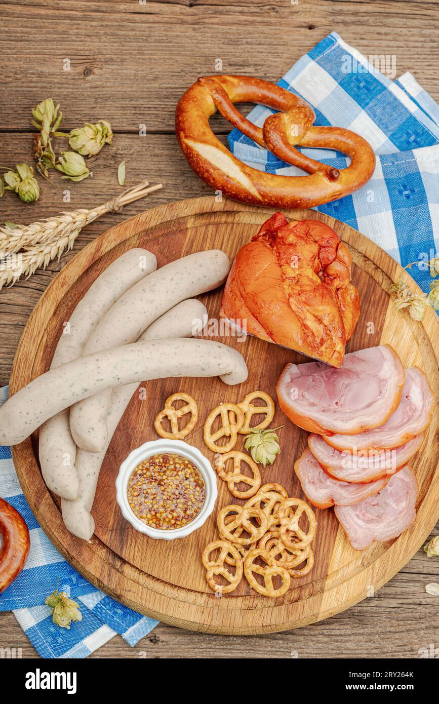 Traditional Oktoberfest set. Pretzels, beer, weisswurst and eisbein ...