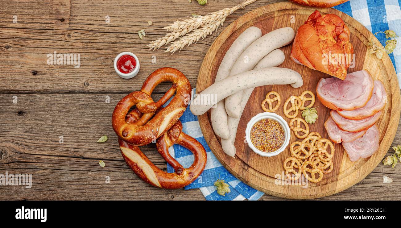 Traditional Oktoberfest set. Pretzels, beer, weisswurst and eisbein ...