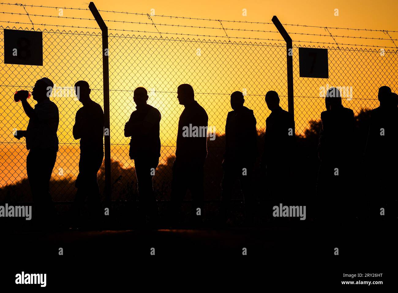 Palestinian workers gather at the Erez crossing between Israel and the ...